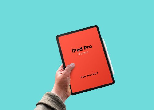 Hand Holding iPad Pro PSD Mockup — Free Mockup World