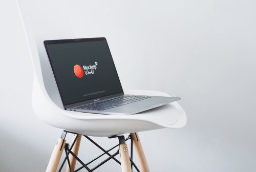 MacBook Pro on a Chair Mockup 01 | Free Mockup World