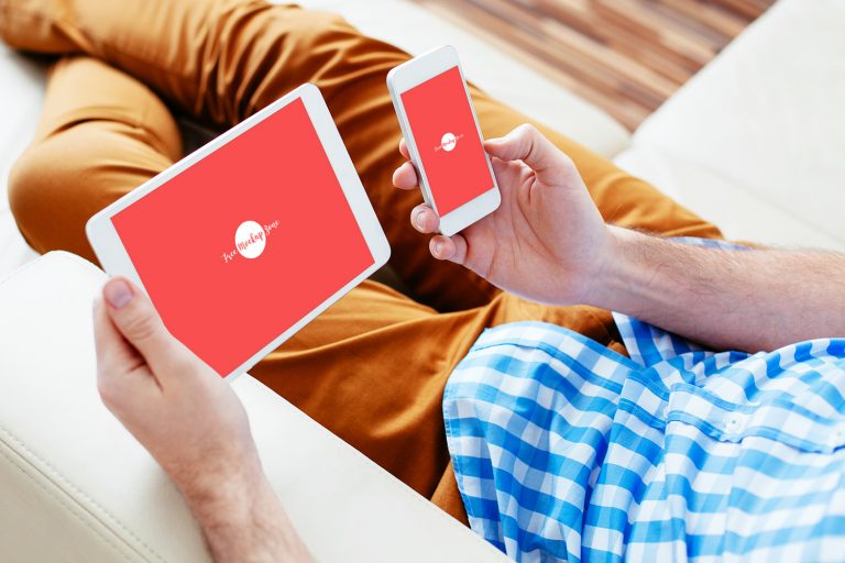 Man Checking His iPad and iPhone Mockup — Free Mockup World